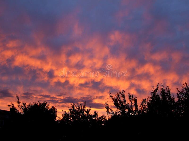 Fiery sunset dusk sky stock photo. Image of kind, litup - 96912504