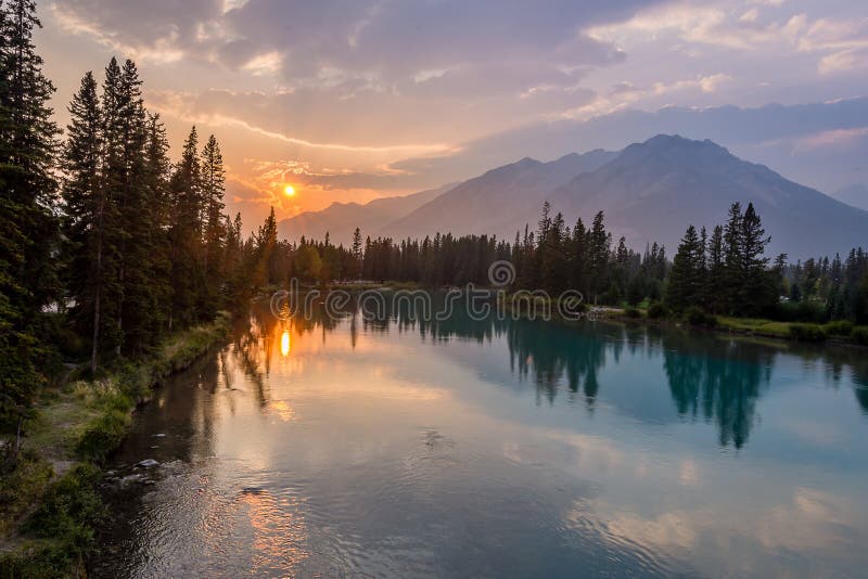 A fiery sunset over Banff stock image. Image of natural - 122966541