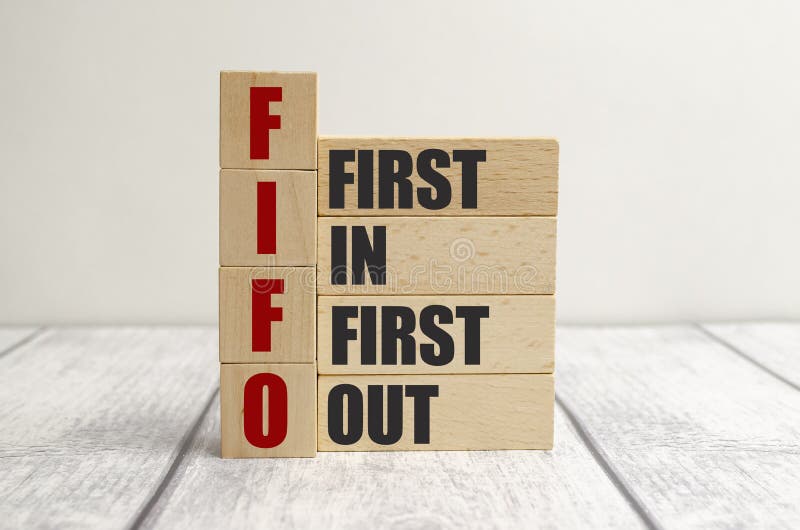 FIFO First in, First Out Word on Wooden Cubes on Wooden Background ...
