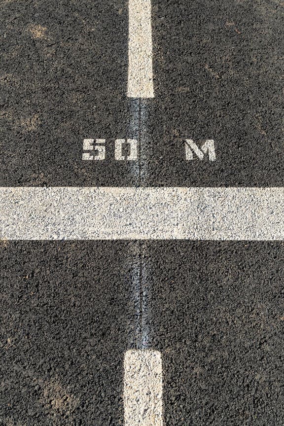 Fifty Meter Mark Painted on Asphalt Stock Photo - Image of rough ...