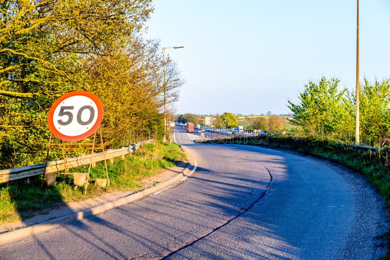 Motorway with Maximum Speed Sign Stock Photo - Image of caution ...
