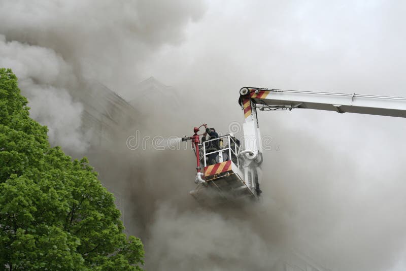 Firefighter in action stock image. Image of danger, voorhout - 19487193