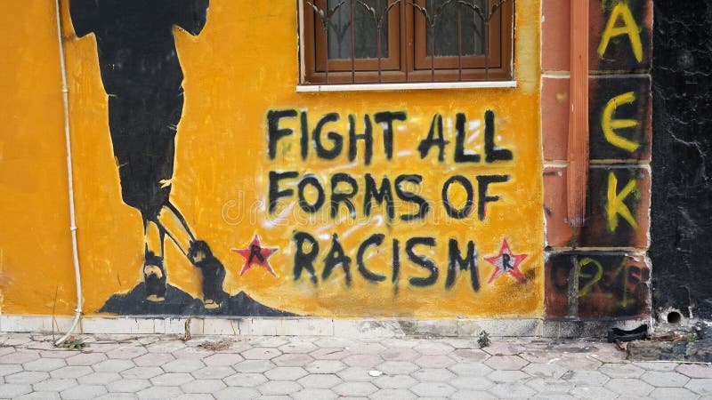 Fight All Forms of Racism Messsage Handwritten on a Wall Editorial ...
