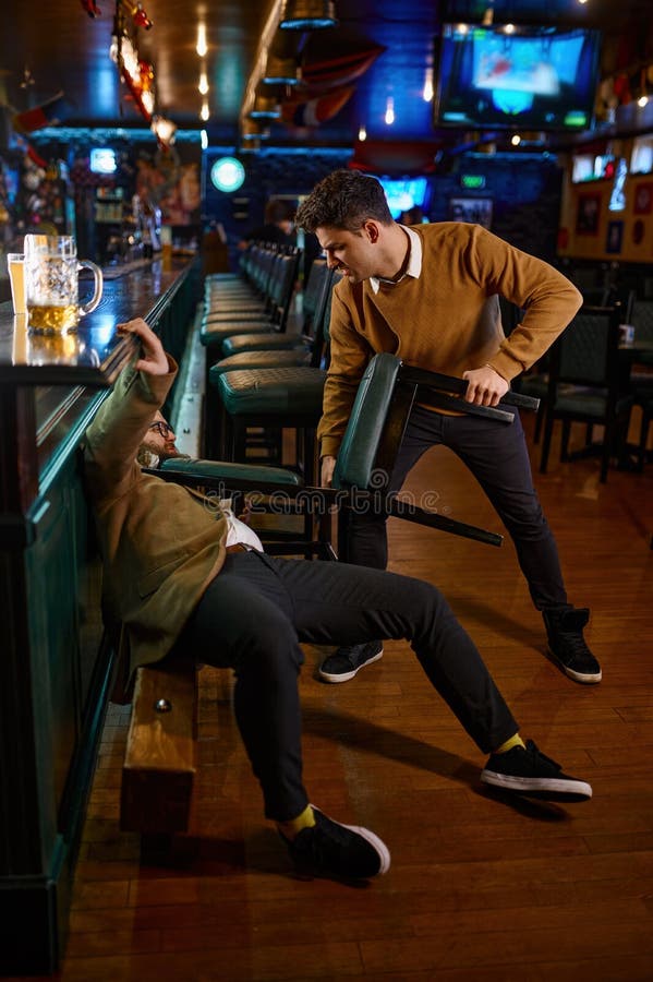 Fight in a Pub, Angry Guy Pulling Friend with Chair Stock Image - Image ...