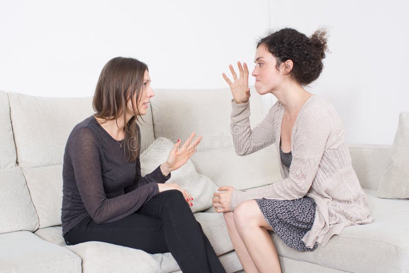 Fight between two women stock image. Image of sofa, discussion - 54649567