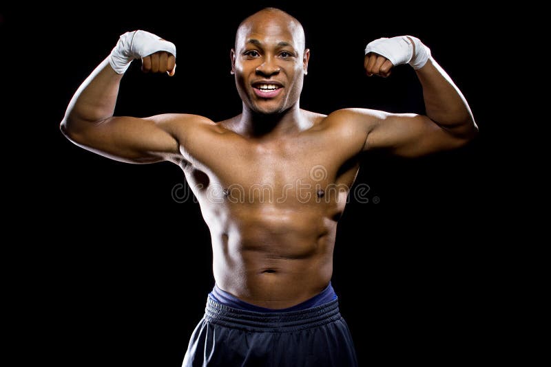 Fighter Flexing Muscles stock photo. Image of abdominal - 51555230