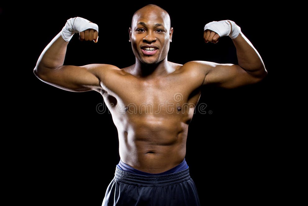 Fighter Flexing Muscles stock photo. Image of abdominal - 51555230