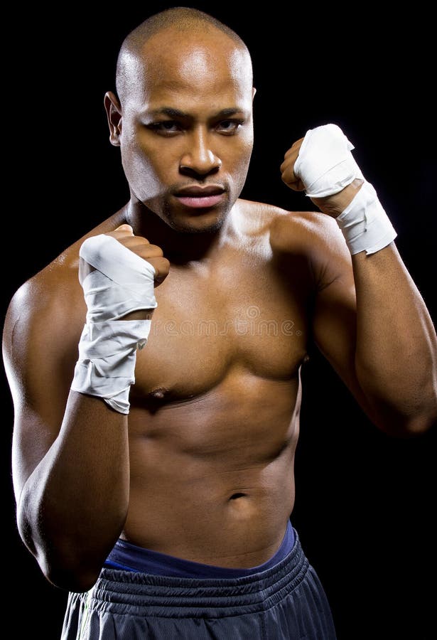 Fighter Flexing Muscles stock image. Image of abdominal - 51555231