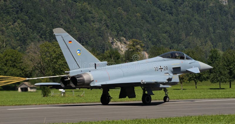 Fighter Jet Landing with Brake Parachute in Mountain Air Base. Copy ...