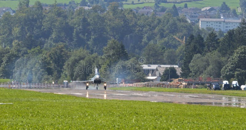 Fighter Jet Landing with Brake Parachute in Mountain Air Base. Copy ...