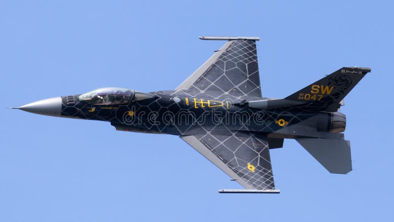 Fighter Jet Soaring into the Sunset Sky, Leaving Behind a Dramatic ...