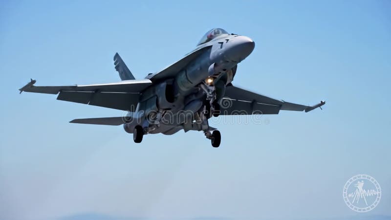 Fighter Jet Soaring through Clear Blue Sky during Flight Demonstration ...