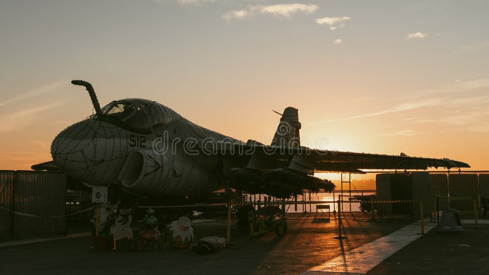 Fighter jet at sunset stock photo. Image of american - 357159456