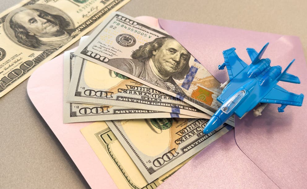 Fighter Plane and Envelope with Dollars. High Quality Photo Stock Image ...