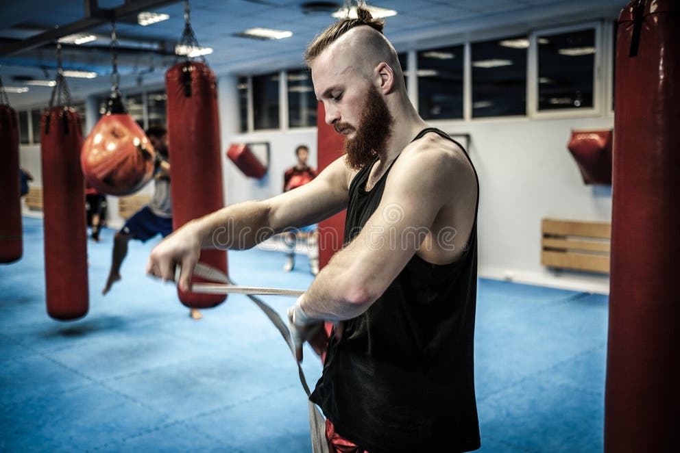 Fighter Preparing for Training, Wrapping Hands with Boxing Wraps Stock ...