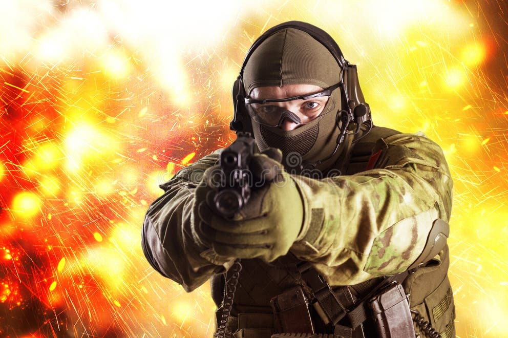 Fighter of a Special Unit is Aiming at the Sight of the Machine Gun ...