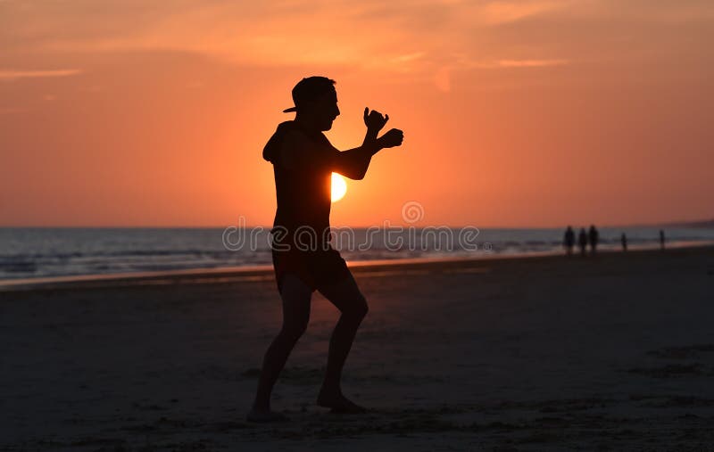 A Fighter Training on the Beach at Sunset Stock Image - Image of boxer ...