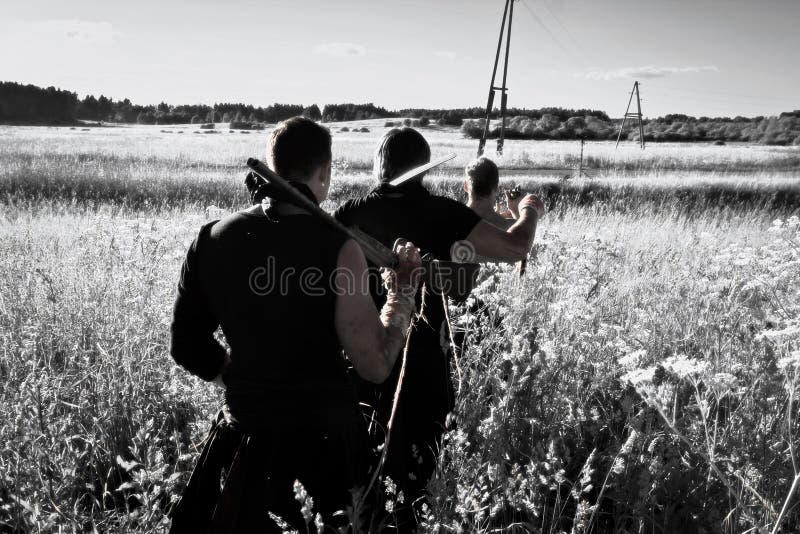 Fighters with weapons stock photo. Image of black, eyes - 81344112