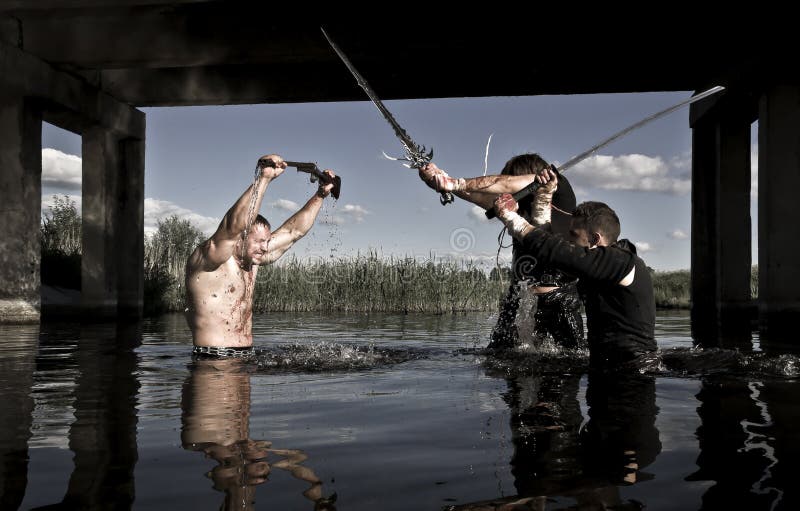 Fighters with weapons stock photo. Image of movement - 81345398