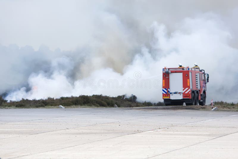 Fighting the fire stock photo. Image of hero, firemen - 12696454
