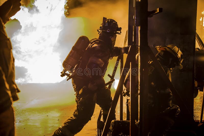 Firefighters Fighting a Fire Stock Image - Image of fire, worker: 47396313