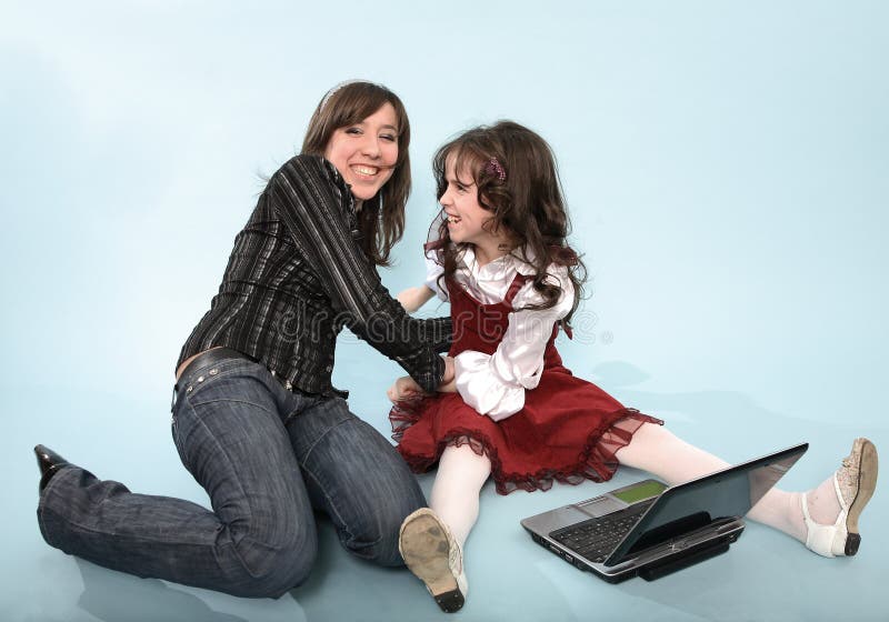 Fighting for Laptop stock image. Image of adorable, little - 8059571