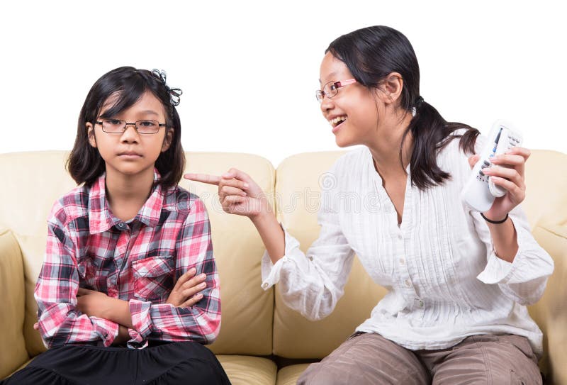 Fighting Over Remote Control II Stock Image - Image of emotion, family ...