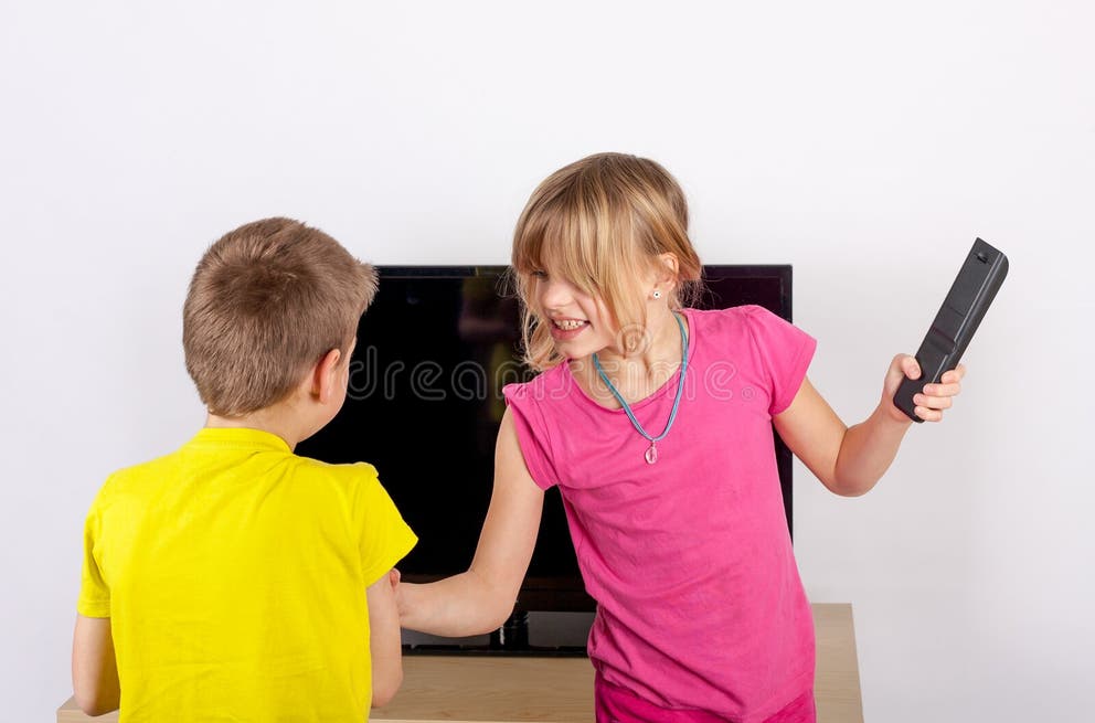 Fighting for the Remote Control Stock Image - Image of young, white ...