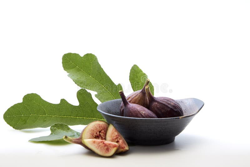 Figs in a a Bowl with Fig Leaf Stock Photo - Image of texture, tropical ...