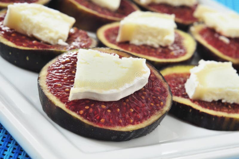 Figs and cheese stock image. Image of figs, fruit, dish - 33778849