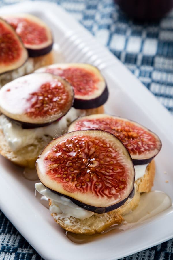 Figs with cheese and honey stock photo. Image of slice - 60941502
