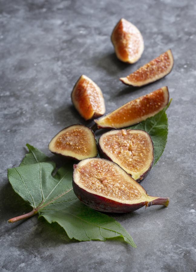 Figs with Green Leaves on Table, Selective Focus. Tropical Delicious ...