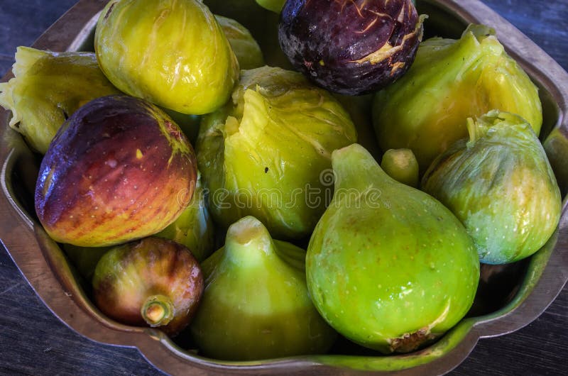Figs in a Silver Plate on a Black Table Stock Image - Image of ...