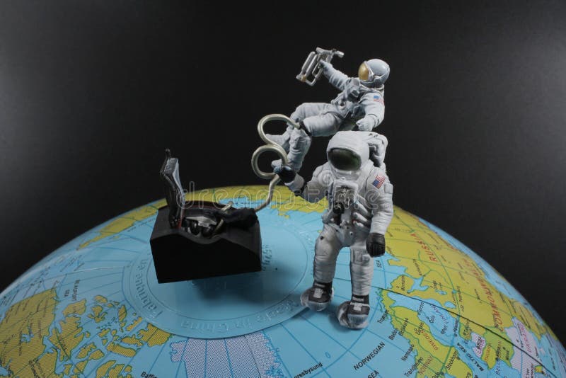 Figure of Astronaut in Outer Space Over of Earth Stock Photo - Image of ...