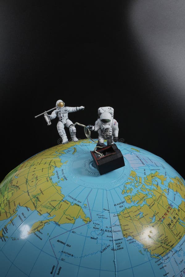 Figure of Astronaut in Outer Space Over of Earth Stock Photo - Image of ...