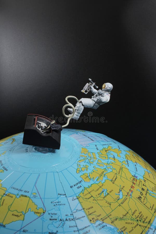 Figure of Astronaut in Outer Space Over of Earth Stock Photo - Image of ...