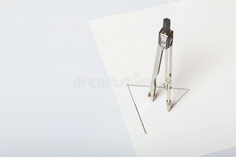 A Figure Drawn by a Compass on White Paper. Triangle, Compass in Space ...
