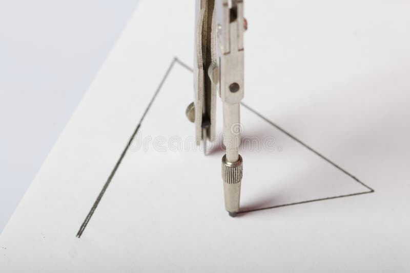 A Figure Drawn by a Compass on White Paper. Triangle, Compass in Space ...