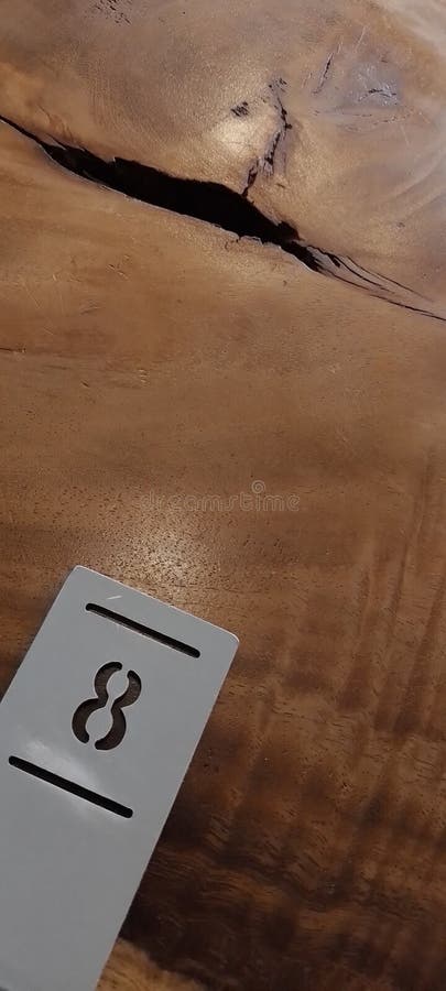 Figure Eight on an Antique Teak Table Stock Photo - Image of circle ...