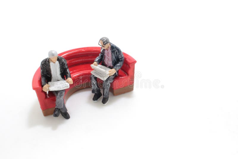 A Figure of a Man Reading a Newspaper Stock Photo - Image of document ...