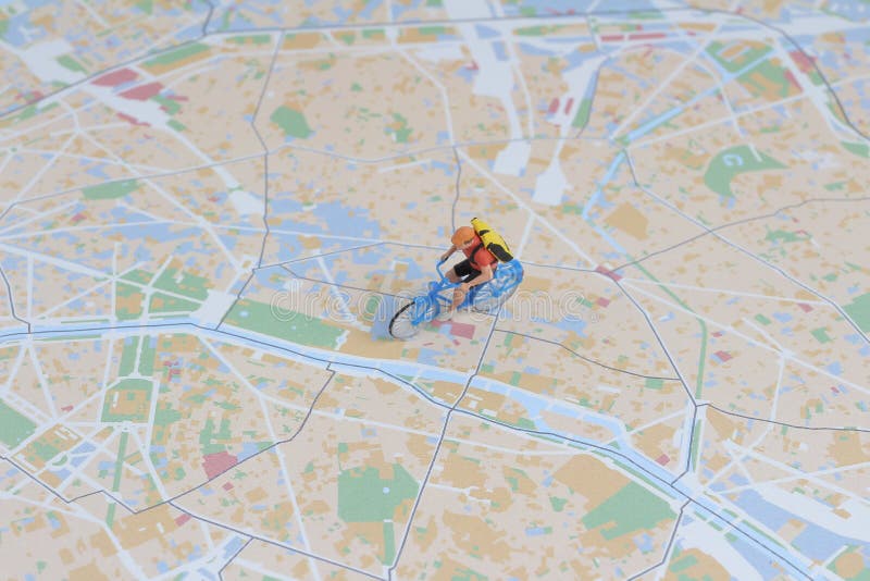 Figure of Man Ride Bicycle on Map Stock Photo - Image of mini, healthy ...
