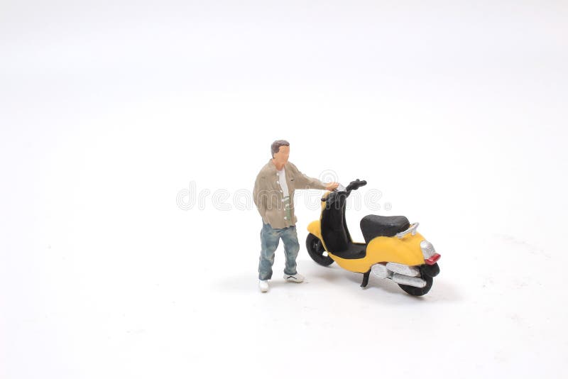 A Figure Man with the Scale Motor Bike Stock Image - Image of sportsman ...