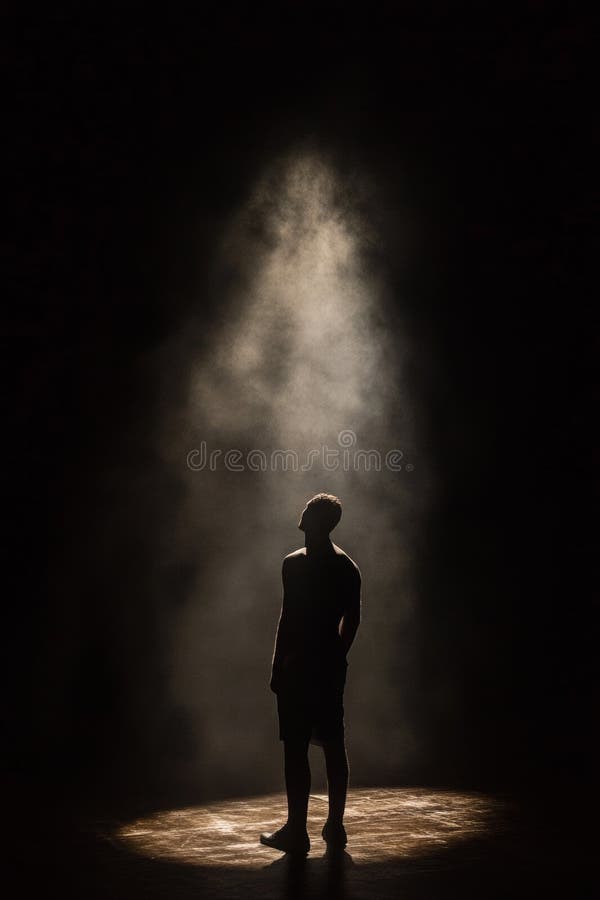 Figure of a Man in a Spotlight Stock Image - Image of figure ...