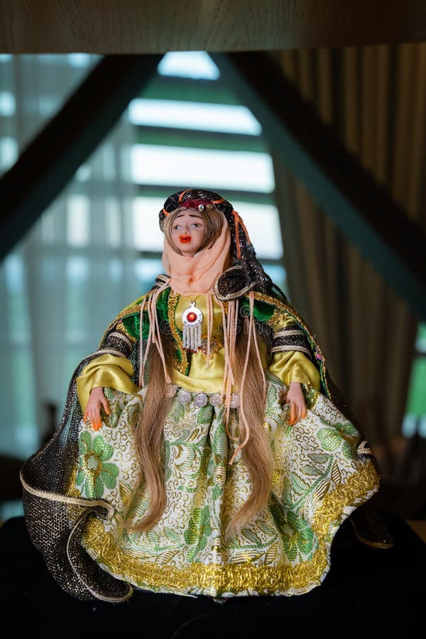 Figure in a National Costume of Silk with Patterns. Stock Photo - Image ...