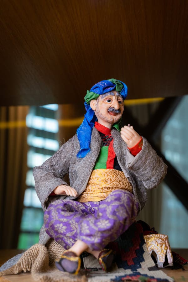 Figure in a National Costume of Silk with Patterns. Stock Photo - Image ...