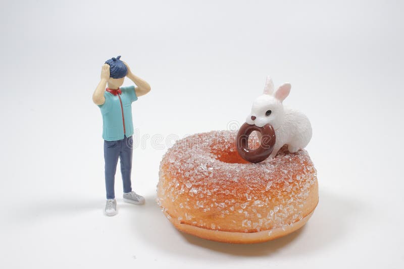 A Figure of Rabbit Steal the Chocolate Donut Stock Image - Image of ...