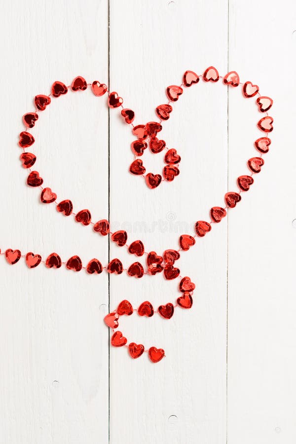 The Figure in the Shape of a Red Heart Chain Stock Image - Image of ...