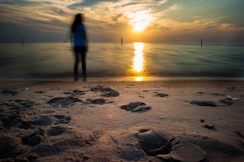 Figure Standing at the Beach Stock Photo - Image of lake, sand: 44040794
