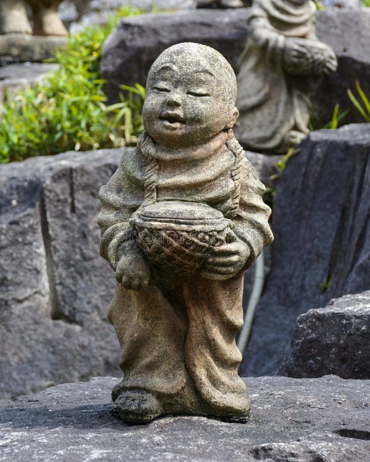 Figure in Stone of Japan stock image. Image of buddha - 317783215