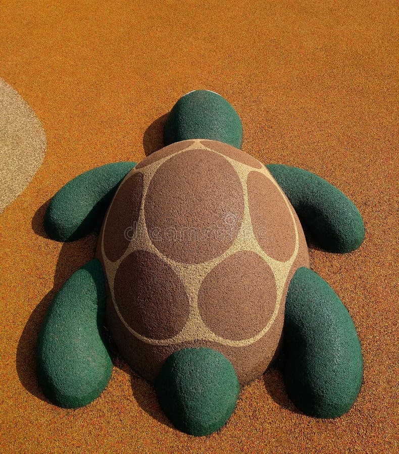 The Figure of a Turtle on the Playground Made of Soft Rubber Crumbs in ...